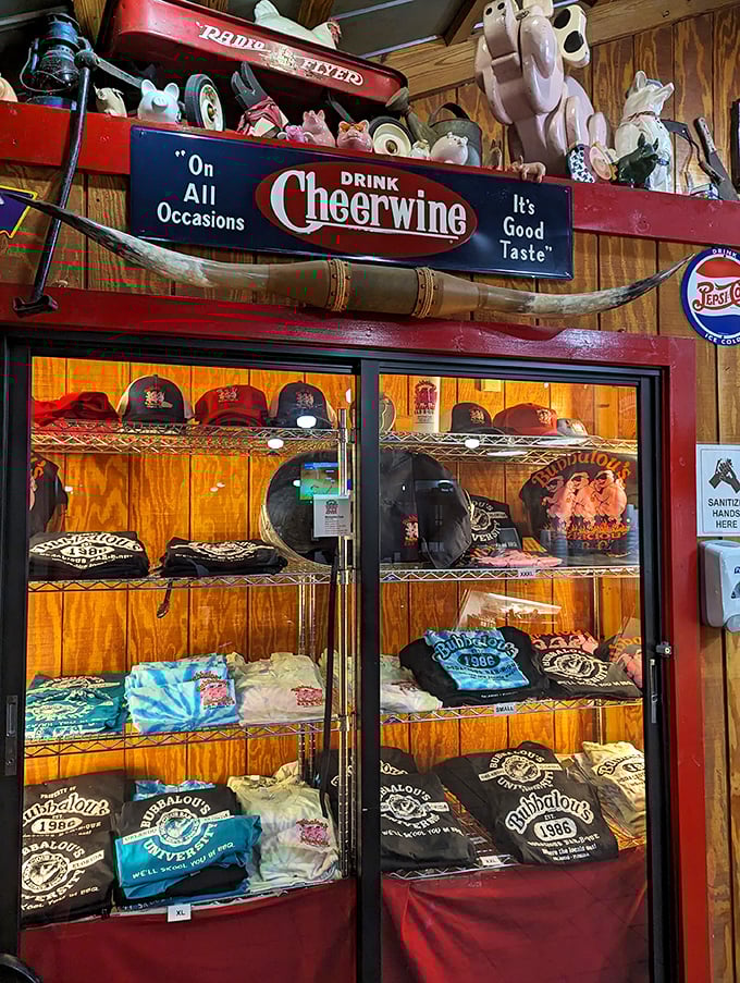 The merch wall—because sometimes wearing the t-shirt is the only way to prove to friends you've found barbecue nirvana.