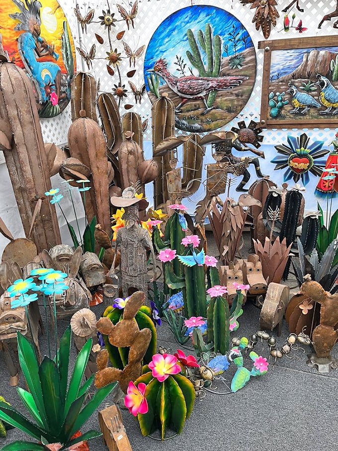 Metal cacti bloom alongside colorful desert art. The perfect southwestern decor for those who can't keep real plants alive – no watering required!