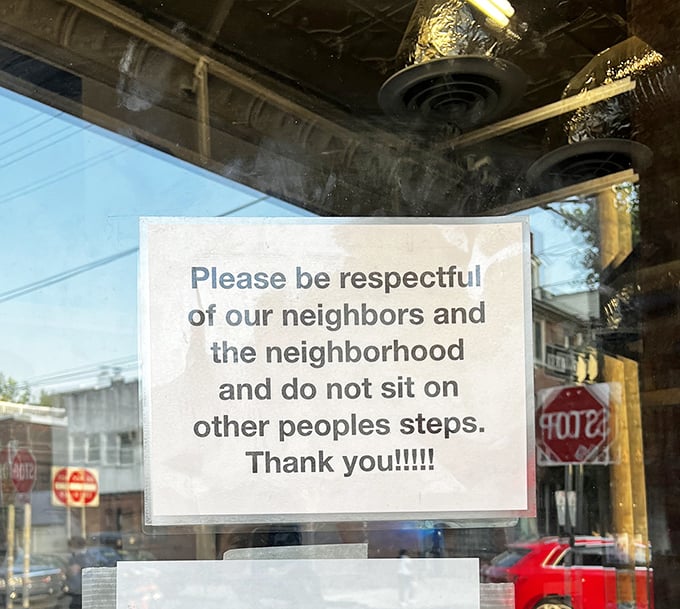A polite reminder that even food paradise has rules. Respect the neighbors—they're the ones who let you know about this place!