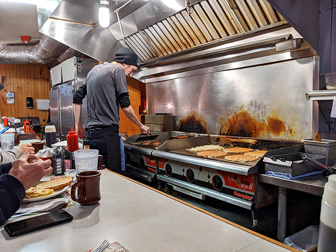 The open kitchen isn't theater—it's transparency. Nothing to hide when you're doing simple food extraordinarily well.