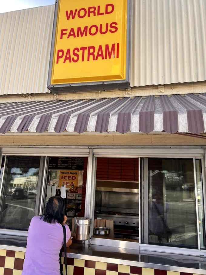 The order window isn't just a place to exchange money for food—it's a portal to a world where pastrami dreams come true.