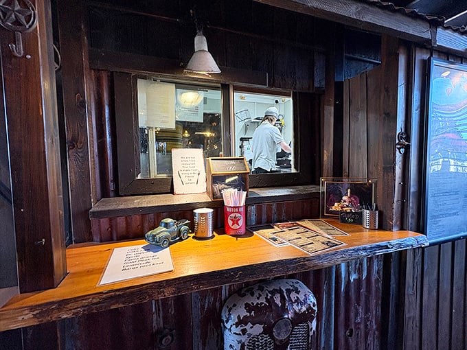 The ordering window – where dreams are placed and burger masterpieces begin their journey from grill to grateful palate.
