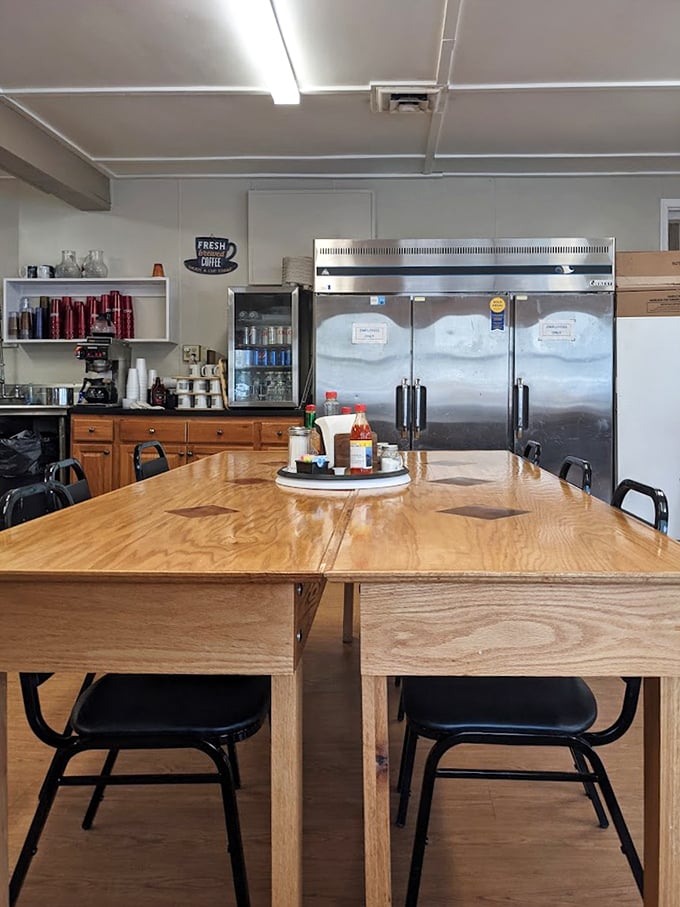 The community table—where solo diners find company, families gather, and the condiment caddy holds the secret to perfect breakfast customization.