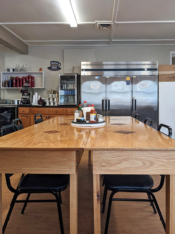 The community table—where solo diners find company, families gather, and the condiment caddy holds the secret to perfect breakfast customization.