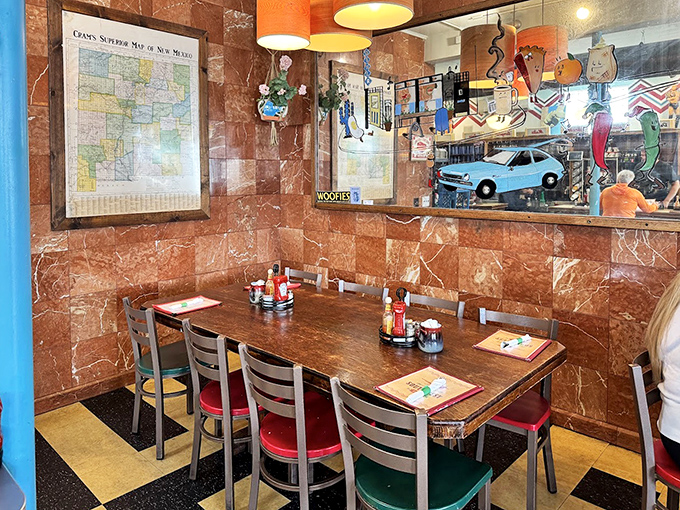 The diner's marbled walls and eclectic décor create a space that feels both timeless and distinctly Southwestern, right down to the map.