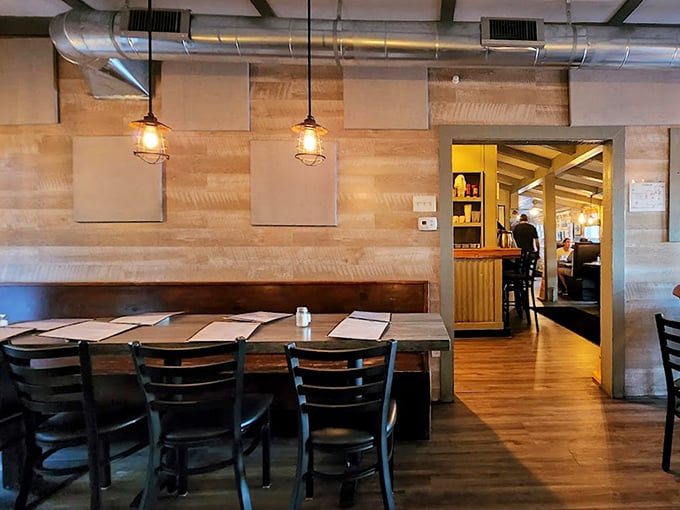 Industrial-chic meets coastal casual. Those acoustic panels aren't just for looks—they're saving your eardrums so you can focus on the flavors.