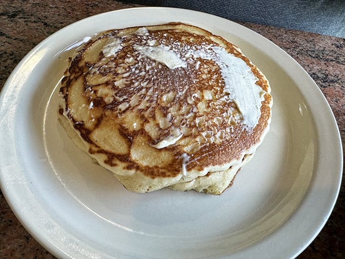 These pancakes aren't just fluffy—they're cloud-like vehicles for butter and syrup, ready to transport you to breakfast nirvana.