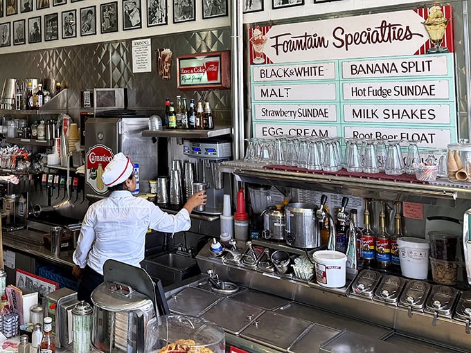 The fountain area isn't just where food is prepared—it's theater. Those menu boards aren't just lists, they're promises of joy.