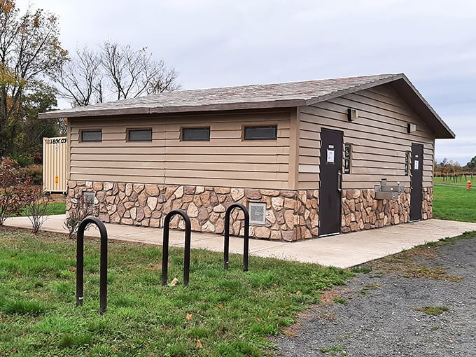 Modern facilities blend seamlessly with natural surroundings – the stone-based restroom building offers welcome comfort during long explorations.