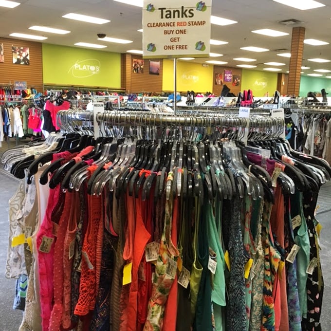 The circular racks – retail's version of a treasure hunt where patience rewards you with hidden gems among the hangers.