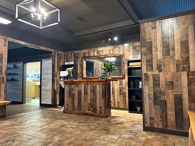 The reception area's weathered wood panels tell you everything: this place takes its steaks seriously, but itself? Not so much.