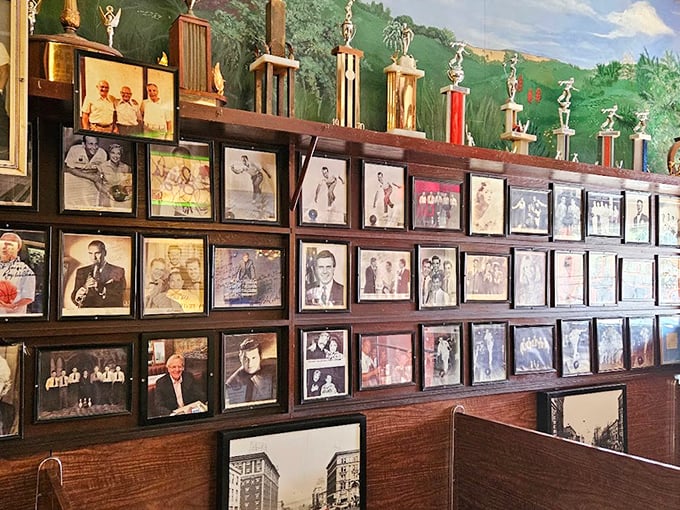 The wall of fame tells stories without words—decades of memories, celebrities, and regular folks who've all fallen under the spell of Luigi's magic.