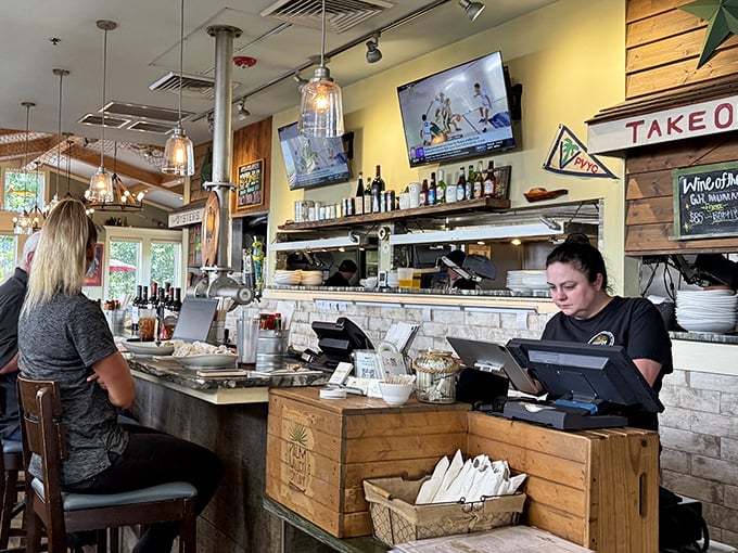 The open kitchen and counter seating – where culinary magic happens before your eyes and friendly banter comes complimentary.