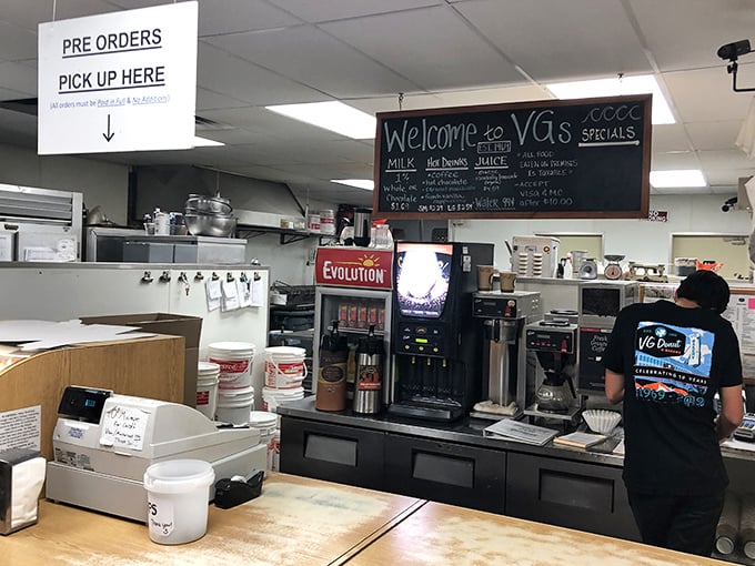That pre-order sign is basically saying "skip the line, smarty pants"—wisdom comes with age and donut experience.