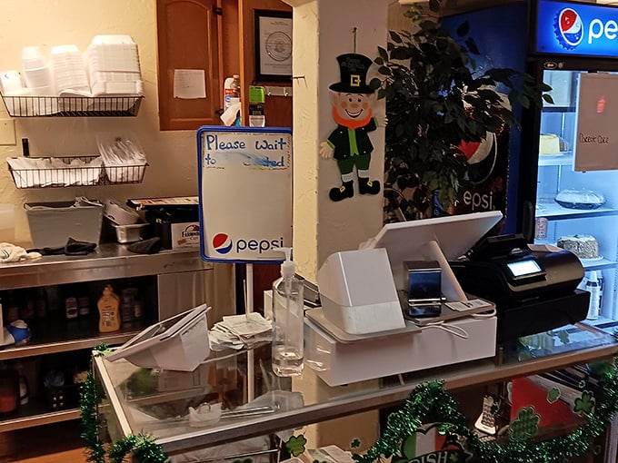 The register area—where you'll reluctantly conclude your Farm House adventure. That leprechaun decoration suggests they're hiding a pot of culinary gold in the kitchen.