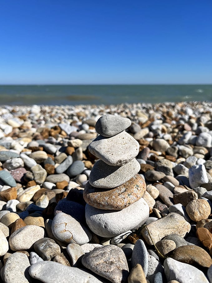 Zen meets Great Lakes geology in these perfectly balanced stones. Someone's meditation practice left behind, inviting you to pause and appreciate life's precarious, beautiful balance.