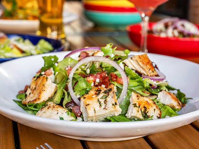 A salad that doesn't apologize for being healthy—it's too busy showing off with grilled chicken, fresh greens, and enough flavor to convert even dedicated carnivores.