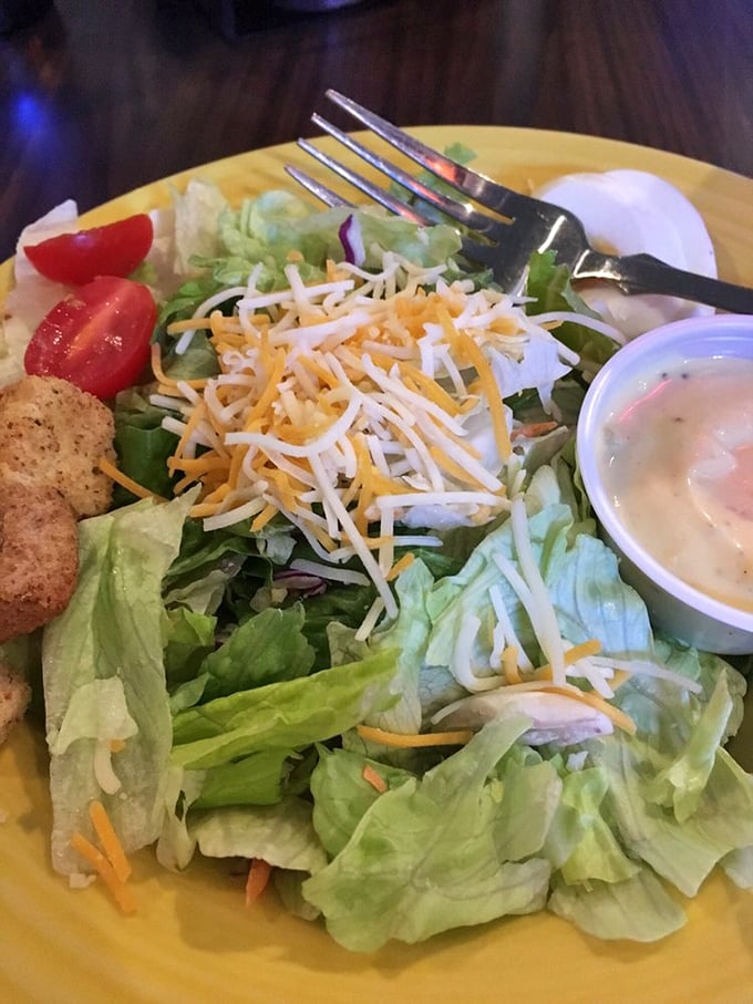 A house salad that defies the "sad salad" stereotype – fresh, colorful, and substantial enough to earn respect at a table of comfort food.