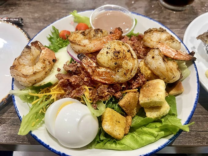 A salad that doesn't apologize for being delicious. Fresh greens, perfectly cooked shrimp, and a hard-boiled egg create a protein-packed prelude to steak.