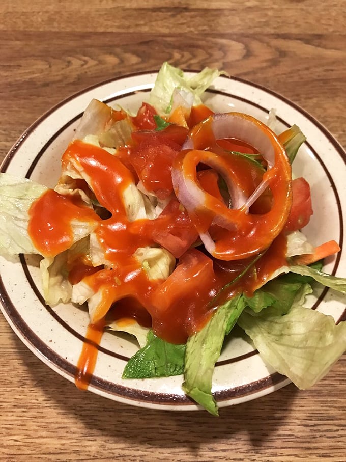 A salad that doesn't pretend to be your doctor's recommendation. That vibrant dressing says, "Yes, vegetables can be fun too."