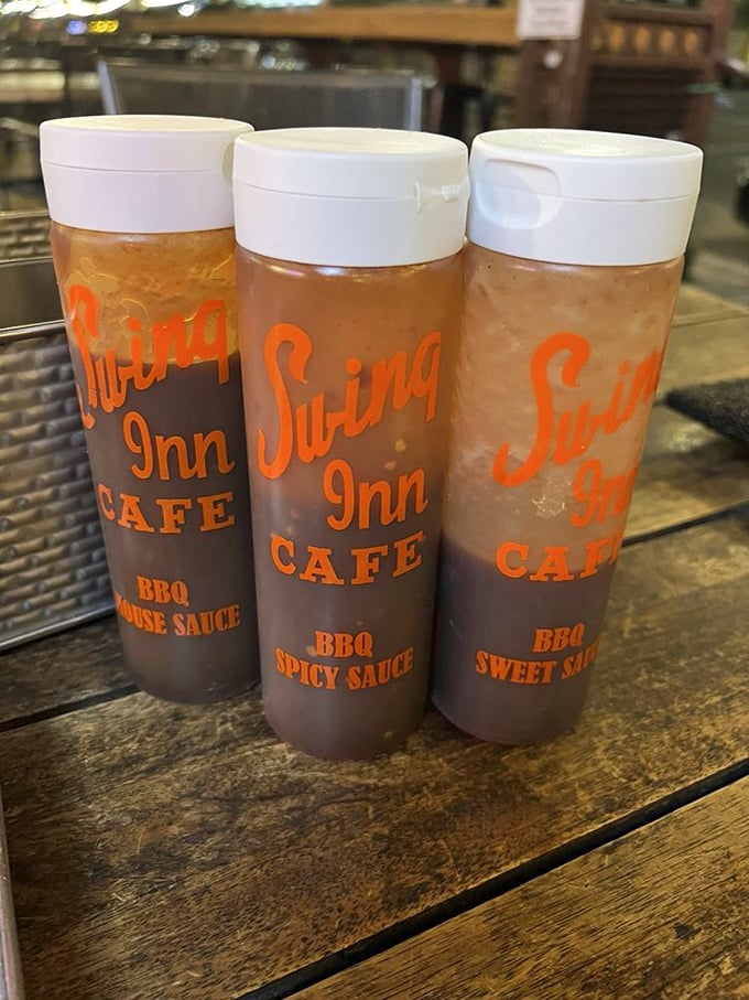 Their sauce collection stands ready like flavor ammunition, each bottle promising its own special kind of magic.