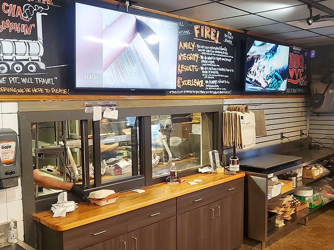 The service counter displays today's smoky treasures like a museum of meat – except you get to eat the exhibits.