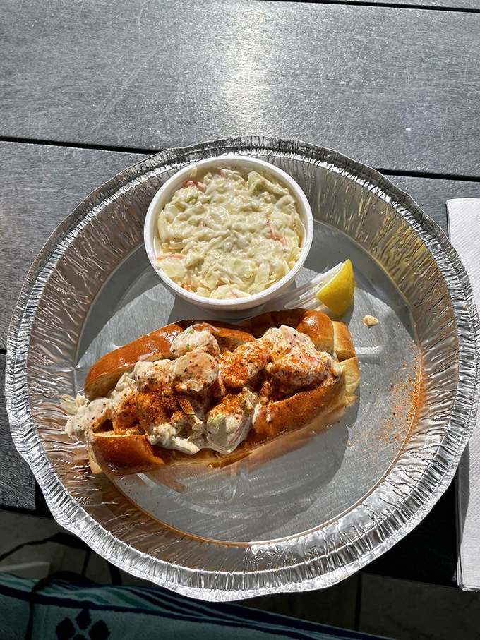 A seafood roll that belongs in the Sandwich Hall of Fame – overflowing with fresh seafood and served with a side of coastal bliss.