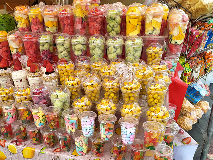 A candy-colored explosion of fruity treats. These cups of joy aren't just snacks—they're portable happiness in transparent containers.