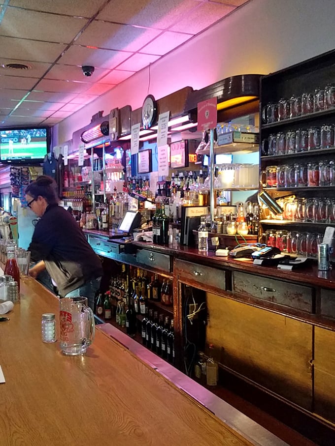 The bar area serves as both social hub and time machine, with decades of memorabilia telling stories of Struthers' past.