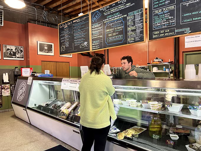 The sacred exchange between sandwich artist and hungry patron – a transaction as old as commerce itself.
