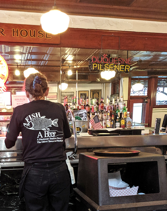 The staff uniform says it all: "A Fish, A Beer"—Pittsburgh's simple but perfect equation for happiness since 1870.