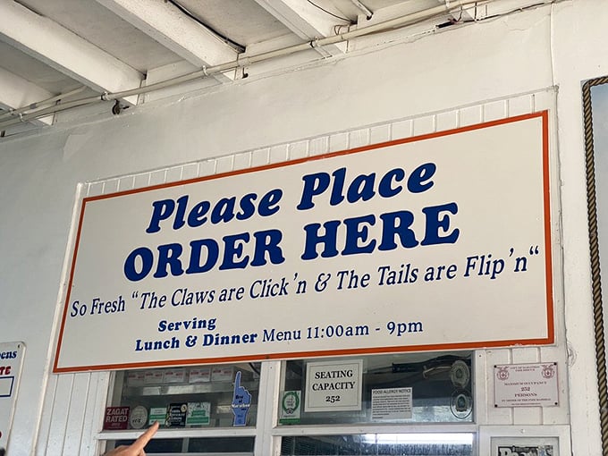 "The claws are click'n & the tails are flip'n" isn't just cute signage—it's the honest-to-goodness truth about the freshness you're about to experience.