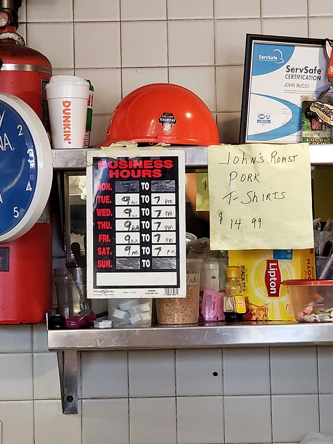 Business hours posted with no-nonsense clarity – when you're this good, simplicity speaks volumes about priorities.