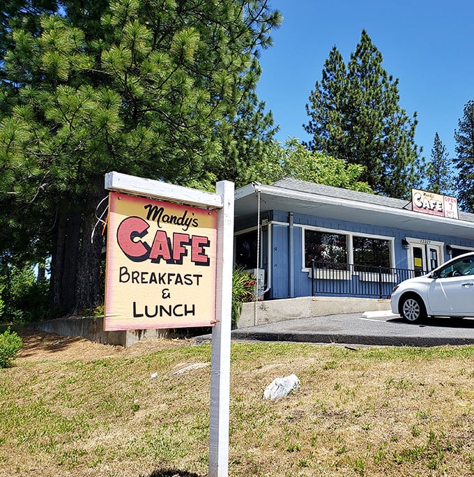 A sign that promises exactly what it delivers—no fancy marketing needed when your pancakes speak for themselves.