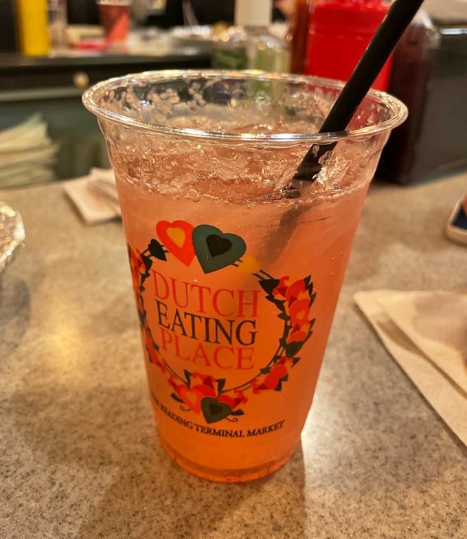 Strawberry lemonade in its natural habitat—the perfect sweet-tart companion for navigating a market full of temptations.