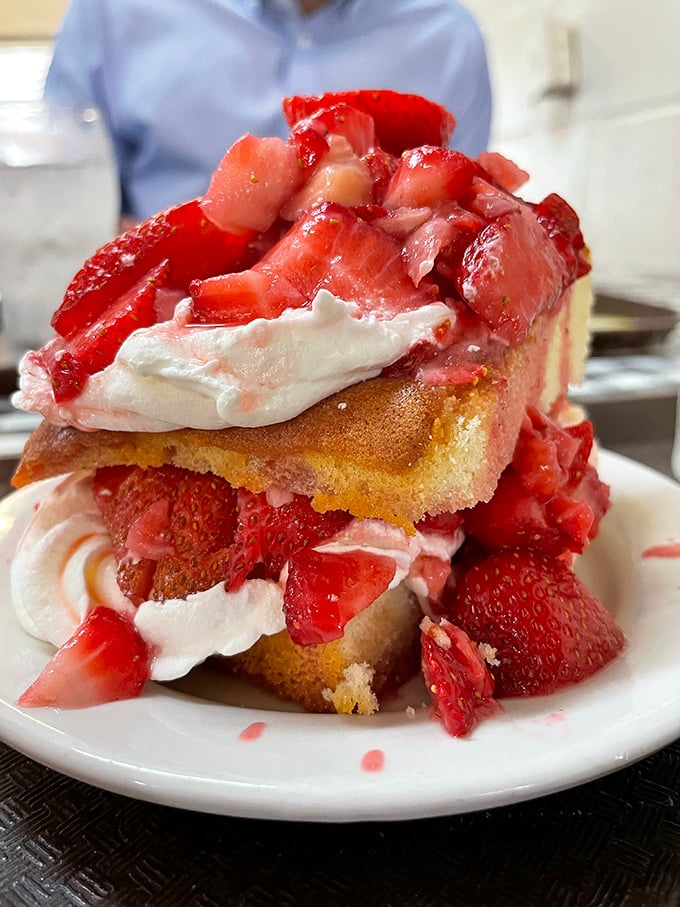 Strawberry shortcake that's worth saving room for—towering layers of cake, berries, and cream that make you wonder why anyone bothers with fancy desserts.