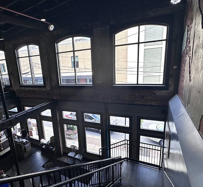 The view from above reveals the architectural drama of this transformed space—where history meets contemporary dining in perfect harmony.
