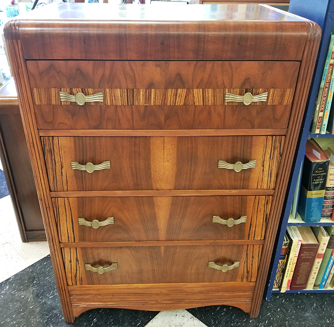 This waterfall dresser with art deco handles has seen more outfit changes than a Hollywood awards show. Still elegant after all these years.