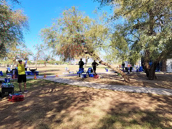 Desert social hour under impossibly blue skies – where strangers become friends united by their mutual appreciation for not being stuck in an office.