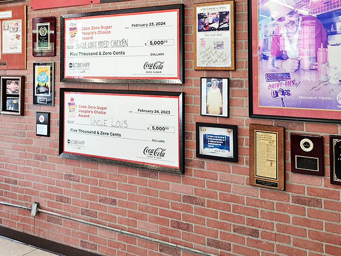 Those award checks on the wall aren't just decoration—they're proof that sometimes the universe does reward exceptional fried chicken.