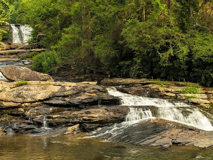 Water flows like liquid glass over smooth stone, creating hypnotic patterns that could mesmerize even the most dedicated smartphone addict.