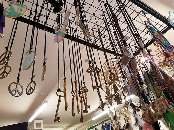 Dangling dreams and vintage keys create a musical constellation overhead—wind chimes that sing with desert breezes.