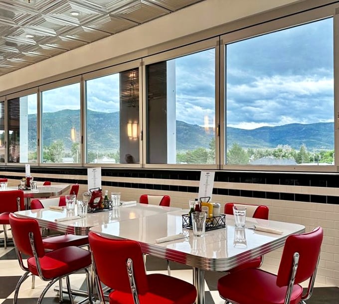 Those mountain views aren't just scenery—they're dinner companions framed by windows that showcase Utah's natural beauty while you feast on local favorites.