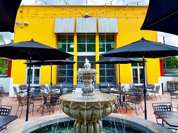 Bright yellow walls practically shout "happiness lives here" while promising pizza adventures that brighten even cloudy days.