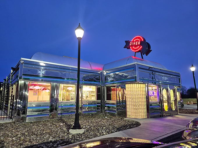Pine Grove Diner glows at twilight, a beacon of hope for the hungry traveler. Where neon dreams and comfort food collide.