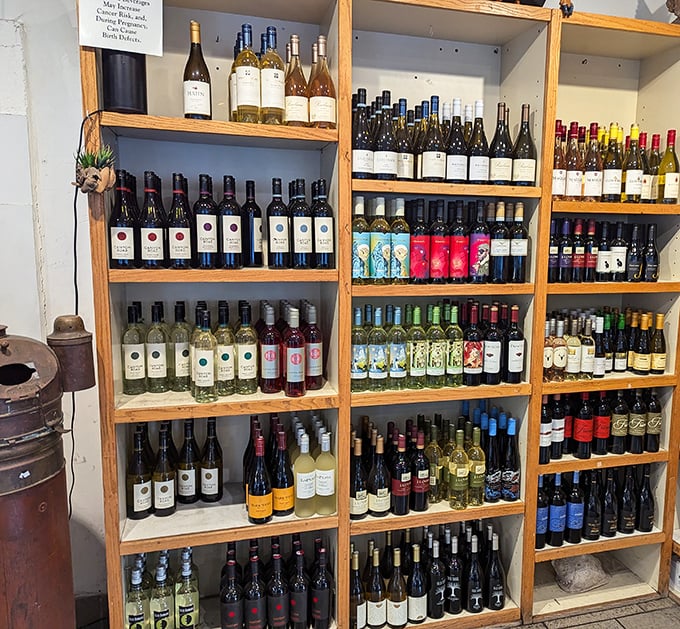 Wine shelves stocked not to impress sommeliers but to complement seafood. These bottles aren't status symbols—they're supporting actors in the culinary performance about to unfold.