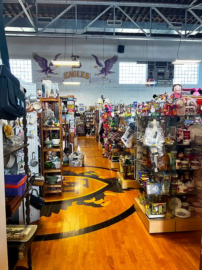 The polished gymnasium floor and Eagles mascot remind us that this building had a previous life before becoming treasure-hunt central.