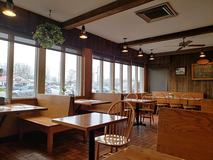 Warm wood tones and Windsor chairs create a dining room that feels like Sunday at your favorite relative's house.