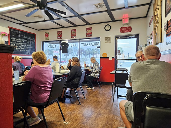 The dining area feels like Florida's living room—where strangers become friends over shared appreciation of perfectly cooked eggs and endless coffee.