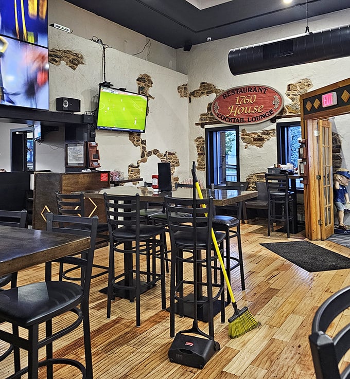 Exposed brick and wooden accents create a space that feels simultaneously historic and contemporary – much like the menu itself.